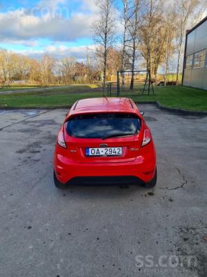 Red Ford Fiesta 2013 in Jelgava, with an engine capacity of 1.00 L and mileage of 120 thousand km for 3800 €, photo 5 on AUTOMOTO.COM.LV