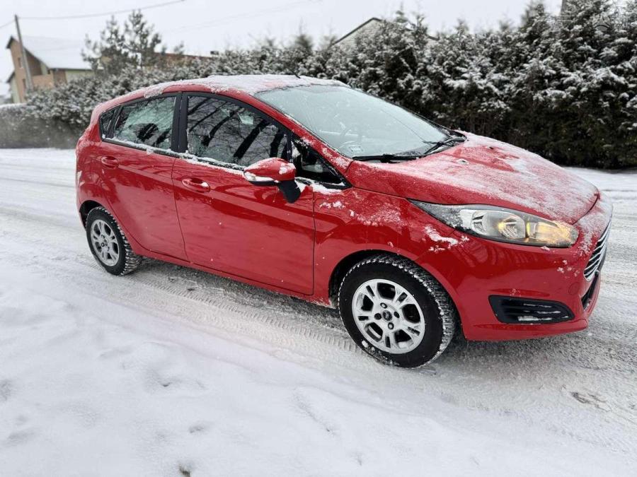 Red Ford Fiesta 2013 in Kaunas, with an engine capacity of 1.00 L and mileage of 130 thousand km for 3450 €, photo 6 on AUTOMOTO.COM.LV
