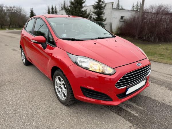 Red Ford Fiesta 2013 in Kaunas, with an engine capacity of 1.00 L and mileage of 140 thousand km for 3400 €, photo 1 on AUTOMOTO.COM.LV