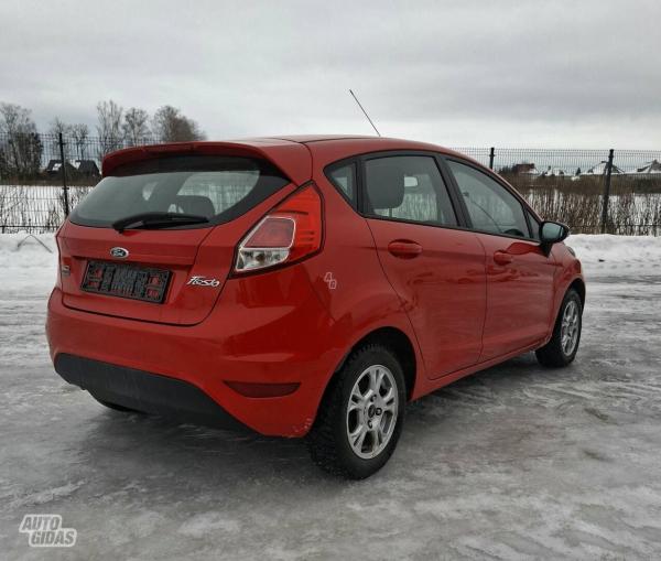 Red Ford Fiesta 2013 in Kaunas, with an engine capacity of 1.00 L and mileage of 140 thousand km for 3400 €, photo 5 on AUTOMOTO.COM.LV