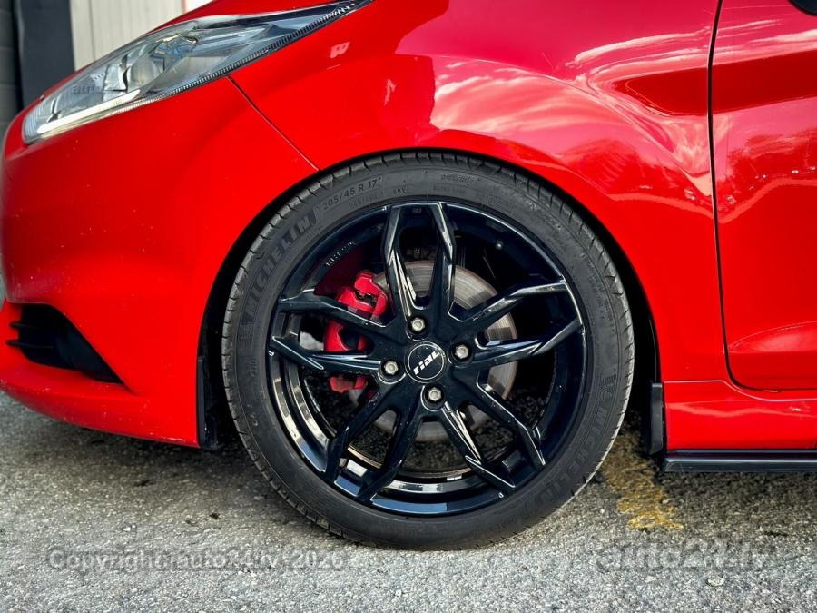 Red Ford Fiesta 2013 in Tallinn, with an engine capacity of 1.60 L and mileage of 258 thousand km for 6200 €, photo 14 on AUTOMOTO.COM.LV