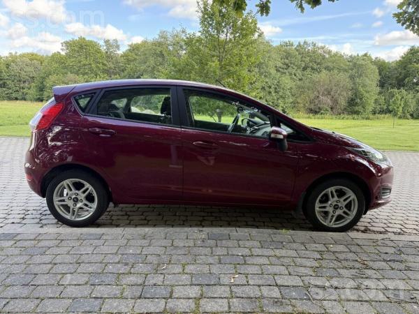 Red Ford Fiesta 2014 in Talsi, with an engine capacity of 1.00 L and mileage of 214 thousand km for 4650 €, photo 3 on AUTOMOTO.COM.LV