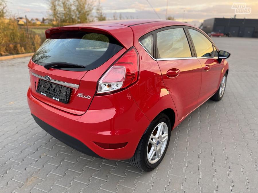Red Ford Fiesta 2014 in Kaunas, with an engine capacity of 1.00 L and mileage of 113 thousand km for 3500 €, photo 8 on AUTOMOTO.COM.LV