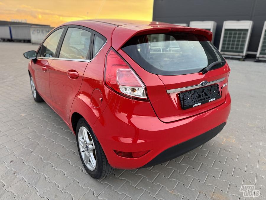 Red Ford Fiesta 2014 in Kaunas, with an engine capacity of 1.00 L and mileage of 113 thousand km for 3500 €, photo 9 on AUTOMOTO.COM.LV
