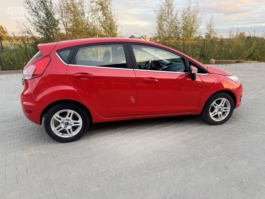Red Ford Fiesta 2014 in Kaunas, with an engine capacity of 1.00 L and mileage of 113 thousand km for 3500 €, photo 12 on AUTOMOTO.COM.LV