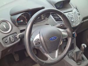 Red Ford Fiesta 2016 in Taurage, with an engine capacity of 1.24 L and mileage of 24 thousand km for 4300 €, photo 7 on AUTOMOTO.COM.LV