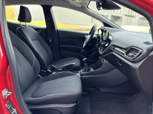 Red Ford Fiesta 2018 in Riga, with an engine capacity of 1.10 L and mileage of 113 thousand km for 7195 €, photo 10 on AUTOMOTO.COM.LV