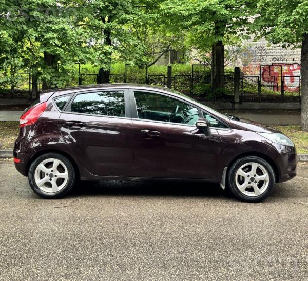 Red Ford Fiesta 2011 in Riga, with an engine capacity of 1.20 L and mileage of 154 thousand km for 2800 €, photo 1 on AUTOMOTO.COM.LV