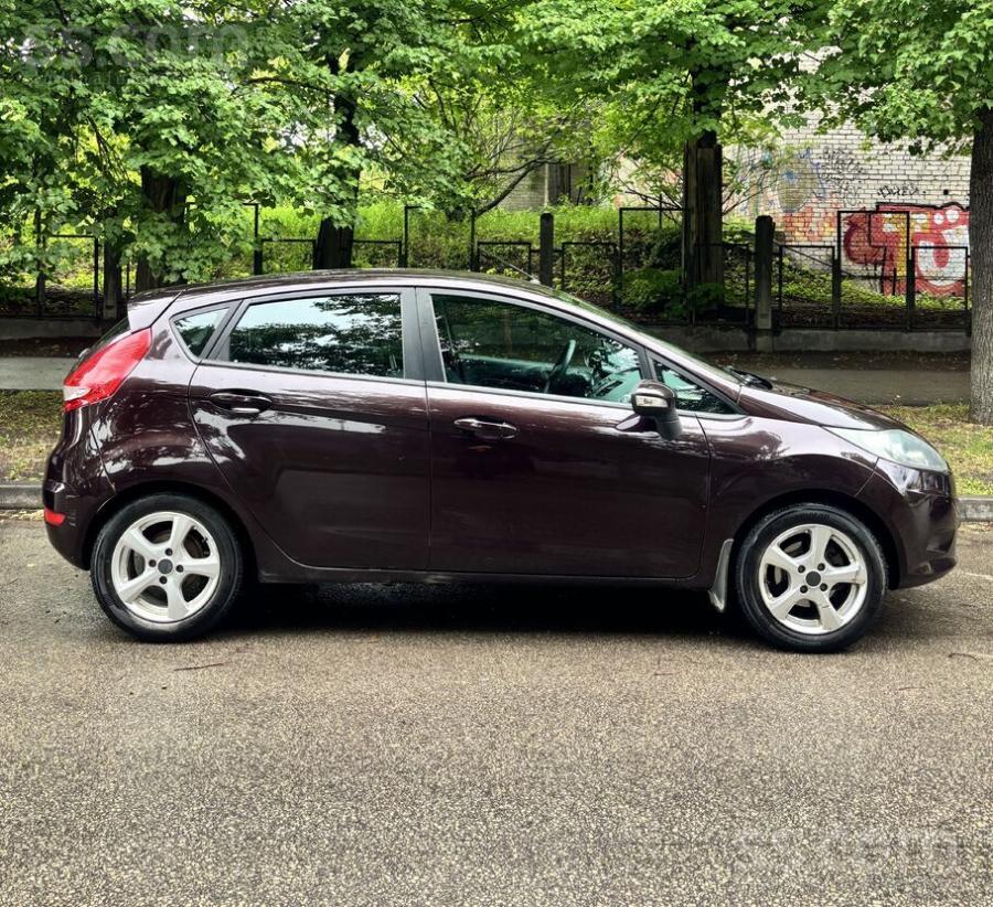 Red Ford Fiesta 2011 in Riga, with an engine capacity of 1.20 L and mileage of 154 thousand km for 2800 €, photo 1 on AUTOMOTO.COM.LV