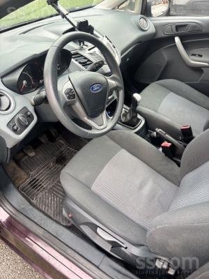 Red Ford Fiesta 2011 in Riga, with an engine capacity of 1.20 L and mileage of 154 thousand km for 2800 €, photo 3 on AUTOMOTO.COM.LV