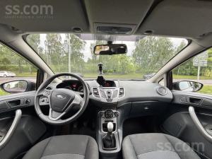 Red Ford Fiesta 2011 in Riga, with an engine capacity of 1.20 L and mileage of 154 thousand km for 2800 €, photo 4 on AUTOMOTO.COM.LV