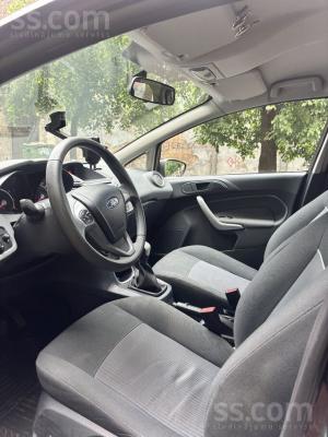 Red Ford Fiesta 2011 in Riga, with an engine capacity of 1.20 L and mileage of 154 thousand km for 2800 €, photo 12 on AUTOMOTO.COM.LV