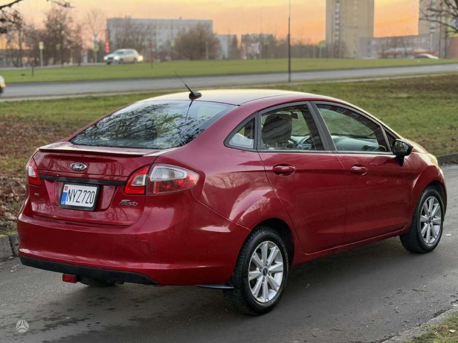 Red Ford Fiesta 2012 in Kaunas, with an engine capacity of 1.60 L and mileage of 151 thousand km for 2500 €, photo 2 on AUTOMOTO.COM.LV