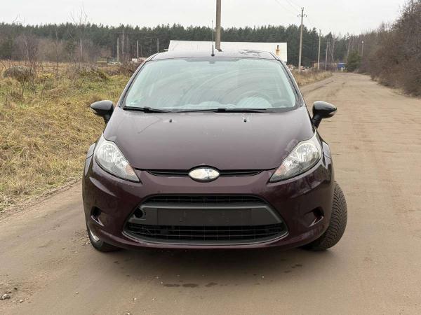 Violet Ford Fiesta 2009 in Vilnius, with an engine capacity of 1.24 L and mileage of 20 thousand km for 2300 €, photo 2 on AUTOMOTO.COM.LV