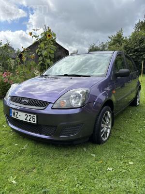 Violet Ford Fiesta 2009 in Kuldiga, with an engine capacity of 1.20 L and mileage of 199 thousand km for 2000 €, photo 3 on AUTOMOTO.COM.LV