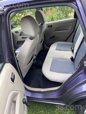 Violet Ford Fiesta 2009 in Kuldiga, with an engine capacity of 1.20 L and mileage of 199 thousand km for 2000 €, photo 9 on AUTOMOTO.COM.LV