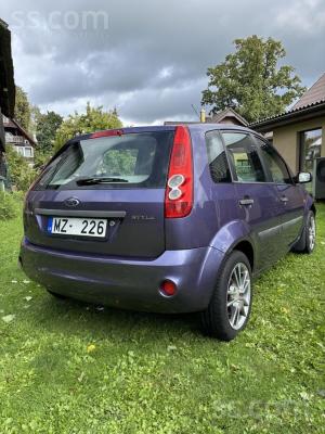 Violet Ford Fiesta 2009 in Kuldiga, with an engine capacity of 1.20 L and mileage of 199 thousand km for 2000 €, photo 10 on AUTOMOTO.COM.LV