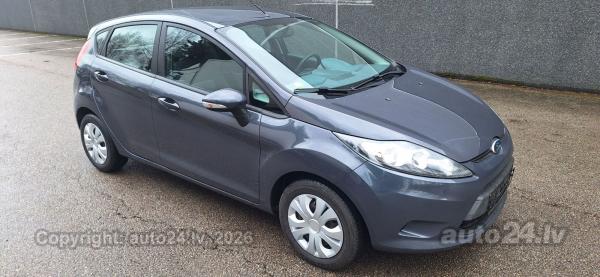 Violet Ford Fiesta 2011 in Parnu, with an engine capacity of 1.40 L and mileage of 244 thousand km for 3290 €, photo 3 on AUTOMOTO.COM.LV