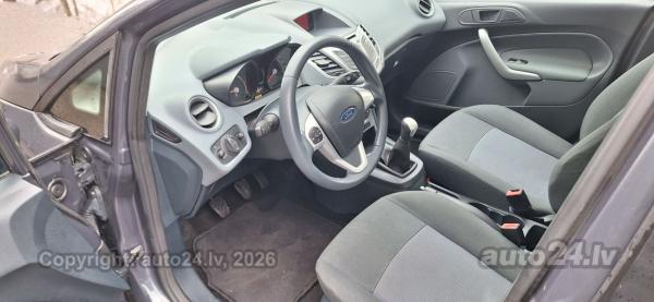 Violet Ford Fiesta 2011 in Parnu, with an engine capacity of 1.40 L and mileage of 244 thousand km for 3290 €, photo 9 on AUTOMOTO.COM.LV