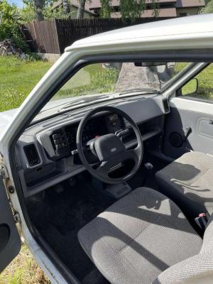 White Ford Fiesta 1986 in Silute, with an engine capacity of 1.60 L and mileage of 243 thousand km for 1490 €, photo 8 on AUTOMOTO.COM.LV
