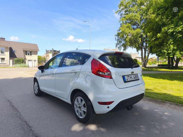 White Ford Fiesta 2009 in Klaipeda, with an engine capacity of 1.40 L and mileage of 117 thousand km for 3700 €, photo 6 on AUTOMOTO.COM.LV