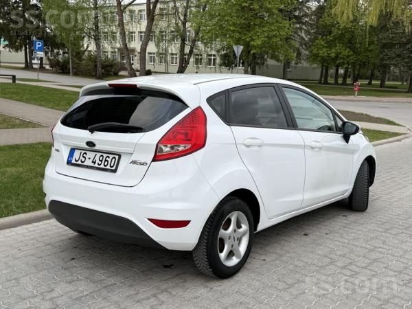 White Ford Fiesta 2010 in Dobele, with an engine capacity of 1.40 L and mileage of 197 thousand km for 1850 €, photo 4 on AUTOMOTO.COM.LV