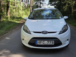 White Ford Fiesta 2011 in Vilnius, with an engine capacity of 1.40 L and mileage of 258 thousand km for 1700 €, photo 3 on AUTOMOTO.COM.LV