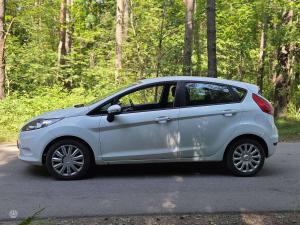 White Ford Fiesta 2011 in Vilnius, with an engine capacity of 1.40 L and mileage of 258 thousand km for 1700 €, photo 8 on AUTOMOTO.COM.LV