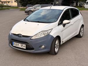White Ford Fiesta 2011 in Kaunas, with an engine capacity of 1.40 L and mileage of 256 thousand km for 1150 €, photo  on AUTOMOTO.COM.LV