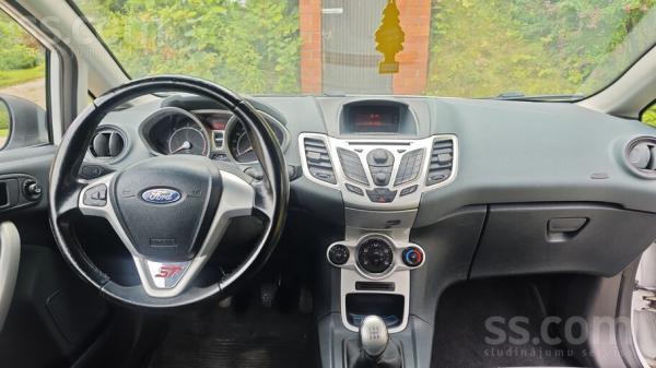 Balts Ford Fiesta 2011 Rīga, ar dzinēja tilpumu 1.40 L un nobraukumu 193 tūkst. km par 2000 €, foto 7 vietnē AUTOMOTO.COM.LV