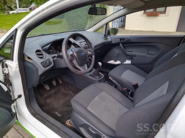 White Ford Fiesta 2011 in Riga, with an engine capacity of 1.40 L and mileage of 192 thousand km for 2700 €, photo 8 on AUTOMOTO.COM.LV