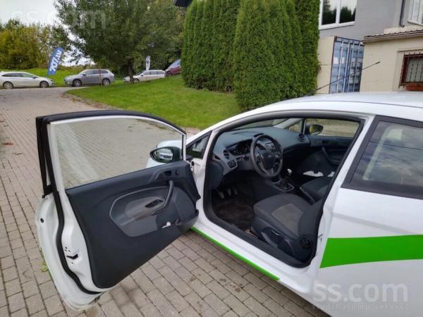 White Ford Fiesta 2011 in Riga, with an engine capacity of 1.40 L and mileage of 192 thousand km for 2700 €, photo 9 on AUTOMOTO.COM.LV