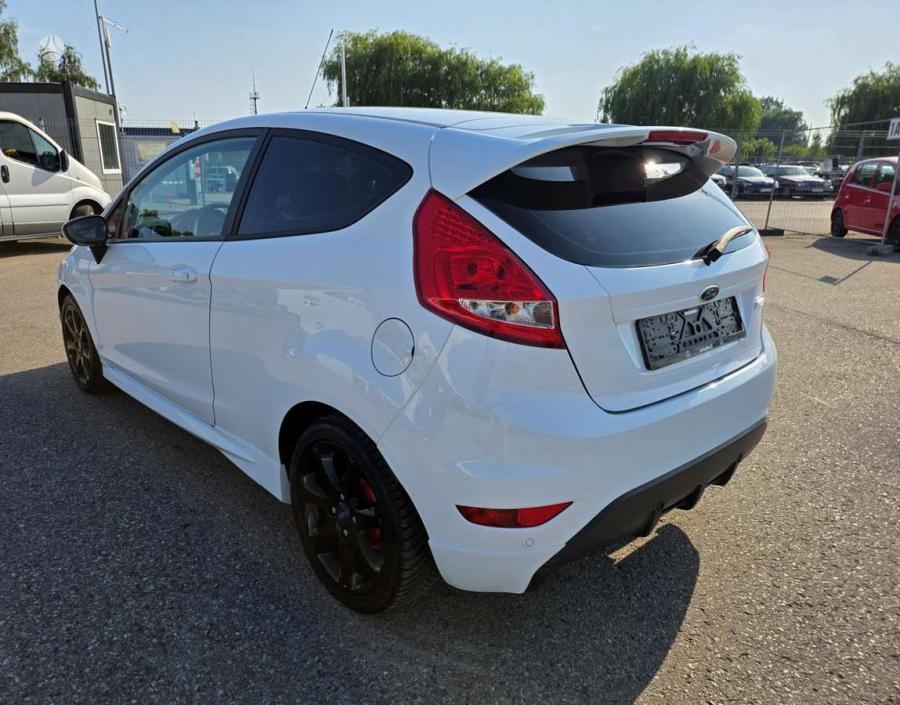 White Ford Fiesta 2012 in Marijampole, with an engine capacity of 1.56 L and mileage of 234 thousand km for 3490 €, photo 15 on AUTOMOTO.COM.LV