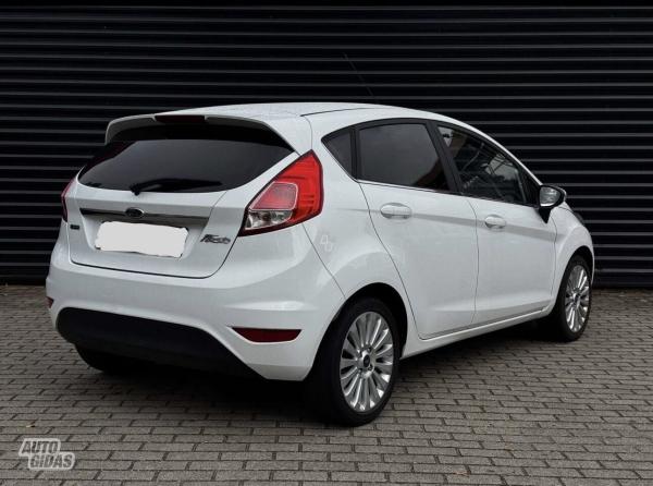 White Ford Fiesta 2013 in Kaunas, with an engine capacity of 1.00 L and mileage of 121 thousand km for 3300 €, photo 4 on AUTOMOTO.COM.LV