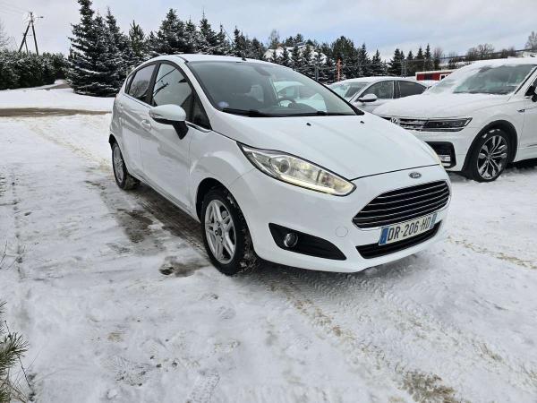 White Ford Fiesta 2015 in Utena, with an engine capacity of 1.00 L and mileage of 123 thousand km for 4100 €, photo 1 on AUTOMOTO.COM.LV