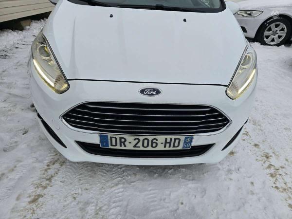 White Ford Fiesta 2015 in Utena, with an engine capacity of 1.00 L and mileage of 123 thousand km for 4100 €, photo 4 on AUTOMOTO.COM.LV