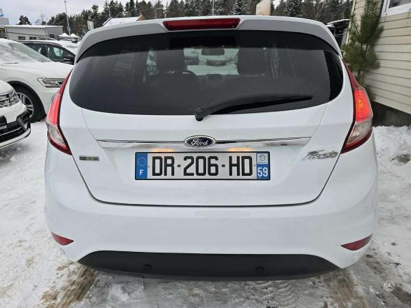 White Ford Fiesta 2015 in Utena, with an engine capacity of 1.00 L and mileage of 123 thousand km for 4100 €, photo 5 on AUTOMOTO.COM.LV