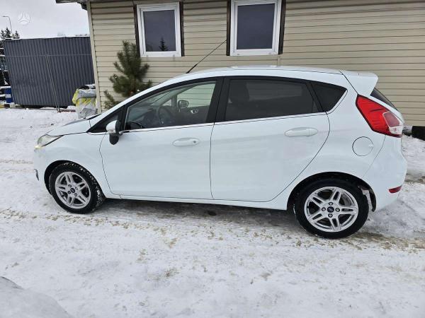 White Ford Fiesta 2015 in Utena, with an engine capacity of 1.00 L and mileage of 123 thousand km for 4100 €, photo 9 on AUTOMOTO.COM.LV