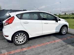 White Ford Fiesta 2015 in Kaunas, with an engine capacity of 1.20 L and mileage of 256 thousand km for 2999 €, photo 3 on AUTOMOTO.COM.LV