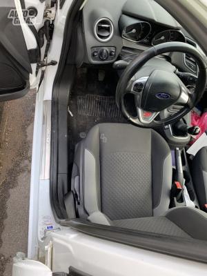 White Ford Fiesta 2015 in Kaunas, with an engine capacity of 1.20 L and mileage of 256 thousand km for 2999 €, photo 5 on AUTOMOTO.COM.LV