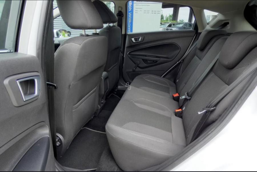 White Ford Fiesta 2015 in Kaunas, with an engine capacity of 1.20 L and mileage of 256 thousand km for 2999 €, photo 6 on AUTOMOTO.COM.LV