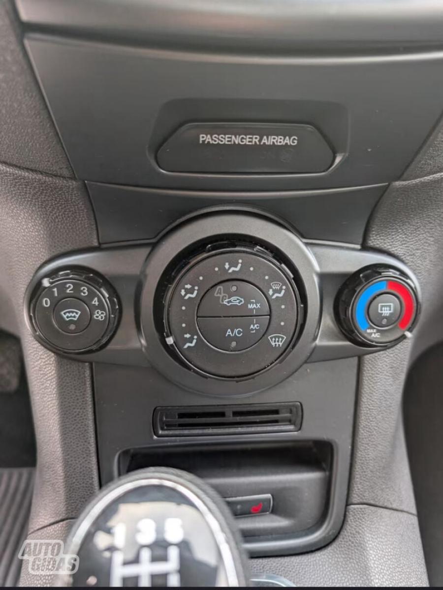 White Ford Fiesta 2015 in Kaunas, with an engine capacity of 1.20 L and mileage of 256 thousand km for 2999 €, photo 12 on AUTOMOTO.COM.LV