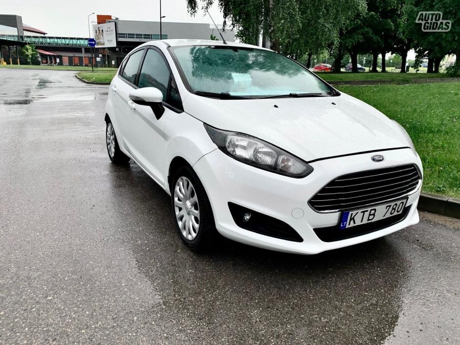 White Ford Fiesta 2015 in Kaunas, with an engine capacity of 1.20 L and mileage of 256 thousand km for 2999 €, photo 15 on AUTOMOTO.COM.LV
