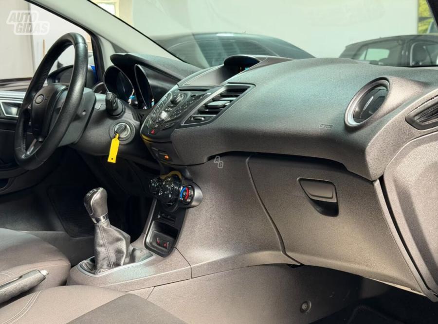 White Ford Fiesta 2015 in Kaunas, with an engine capacity of 1.20 L and mileage of 256 thousand km for 2999 €, photo 16 on AUTOMOTO.COM.LV