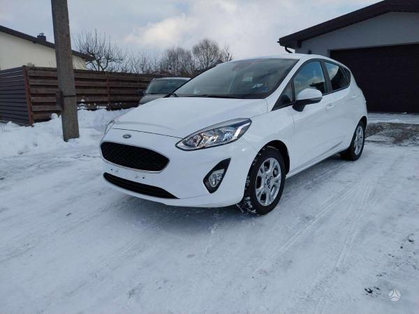 White Ford Fiesta 2018 in Marijampole, with an engine capacity of 1.08 L and mileage of 105 thousand km for 6699 €, photo 5 on AUTOMOTO.COM.LV