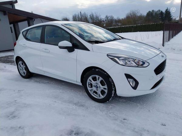 White Ford Fiesta 2018 in Marijampole, with an engine capacity of 1.08 L and mileage of 105 thousand km for 6699 €, photo 7 on AUTOMOTO.COM.LV
