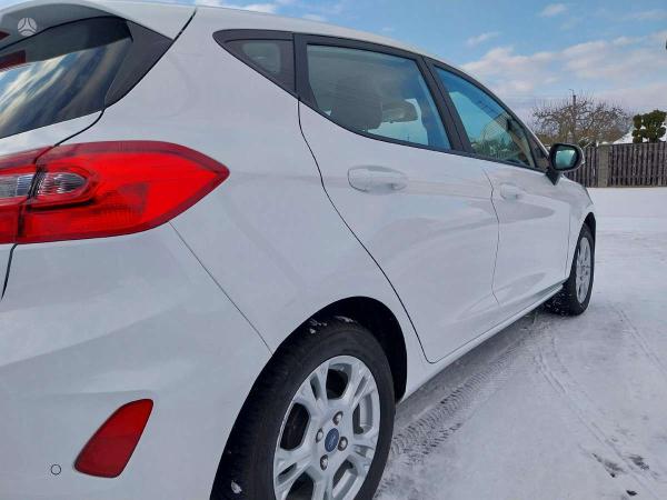 White Ford Fiesta 2018 in Marijampole, with an engine capacity of 1.08 L and mileage of 105 thousand km for 6699 €, photo 9 on AUTOMOTO.COM.LV