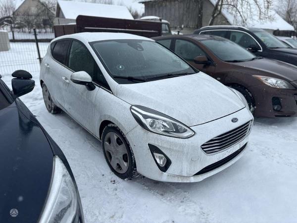 White Ford Fiesta 2018 in Vilnius, with an engine capacity of 1.00 L and mileage of 230 thousand km for 4950 €, photo 3 on AUTOMOTO.COM.LV