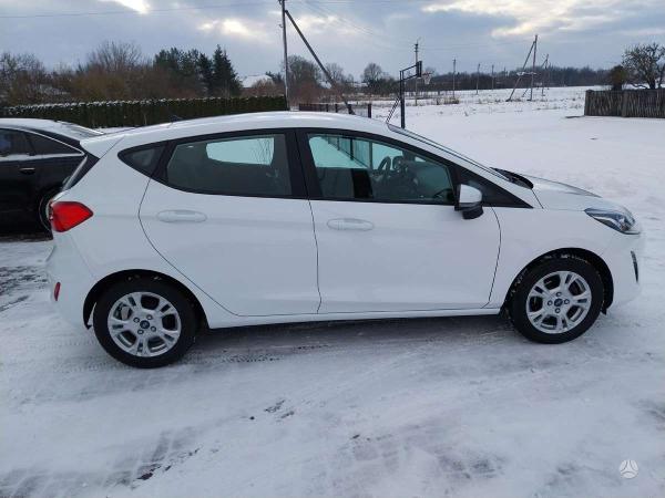 White Ford Fiesta 2018 in Marijampole, with an engine capacity of 1.08 L and mileage of 105 thousand km for 6450 €, photo 9 on AUTOMOTO.COM.LV