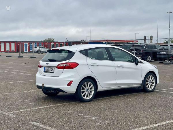 Ford Fiesta 2018 in Vilnius on AUTOMOTO.COM.LV White Ford Fiesta 2018 in Vilnius, with an engine capacity of 1.00 L and mileage of 180 thousand km for 3500 €, photo 6 on AUTOMOTO.COM.LV